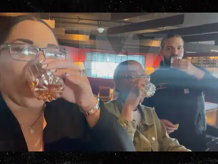 Drake Takes Shots with Fans At Airport Bar | VIDEO
